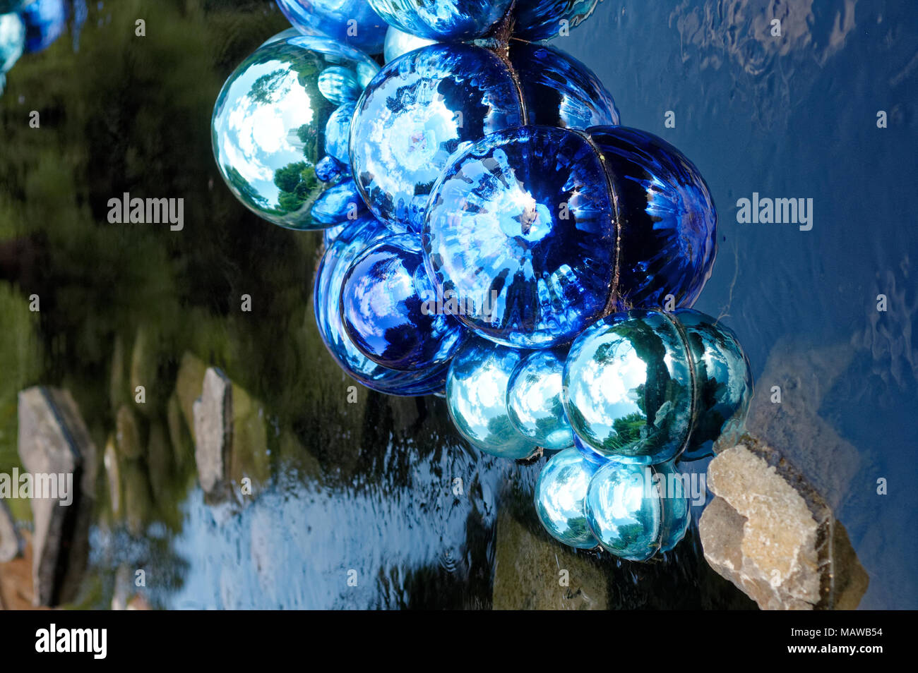 Blue Balls in the Water Colorful Blown Glass Sculpture Stock Photo - Alamy