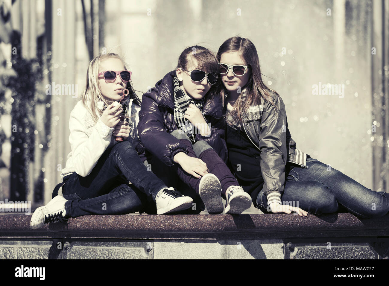 Group of happy teen girls in a city street Stock Photo - Alamy