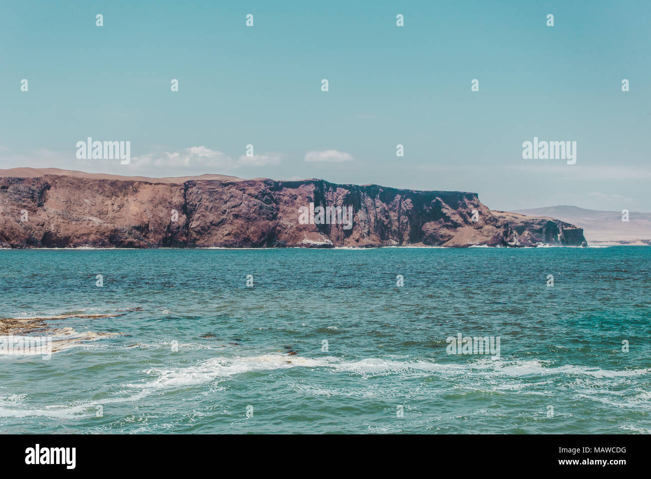 Large looming cliffs of the Paracas National Reserve in Ica, Peru ...
