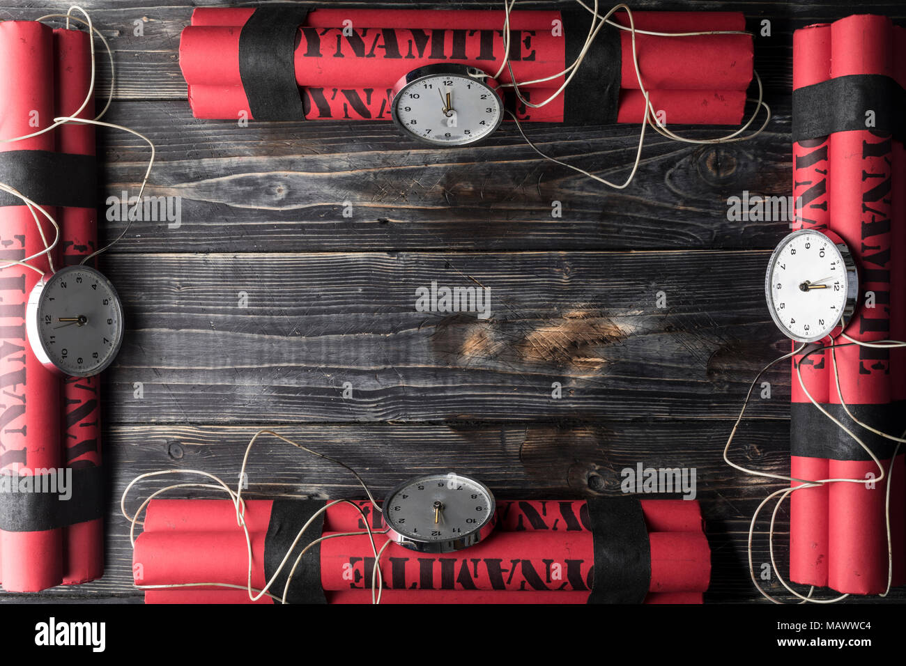 Wood background with dynamite, dangerous concept Stock Photo - Alamy