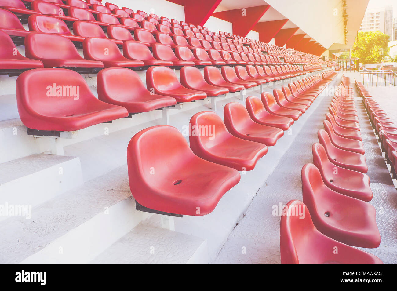 row of red seat at public sport stadium Stock Photo - Alamy