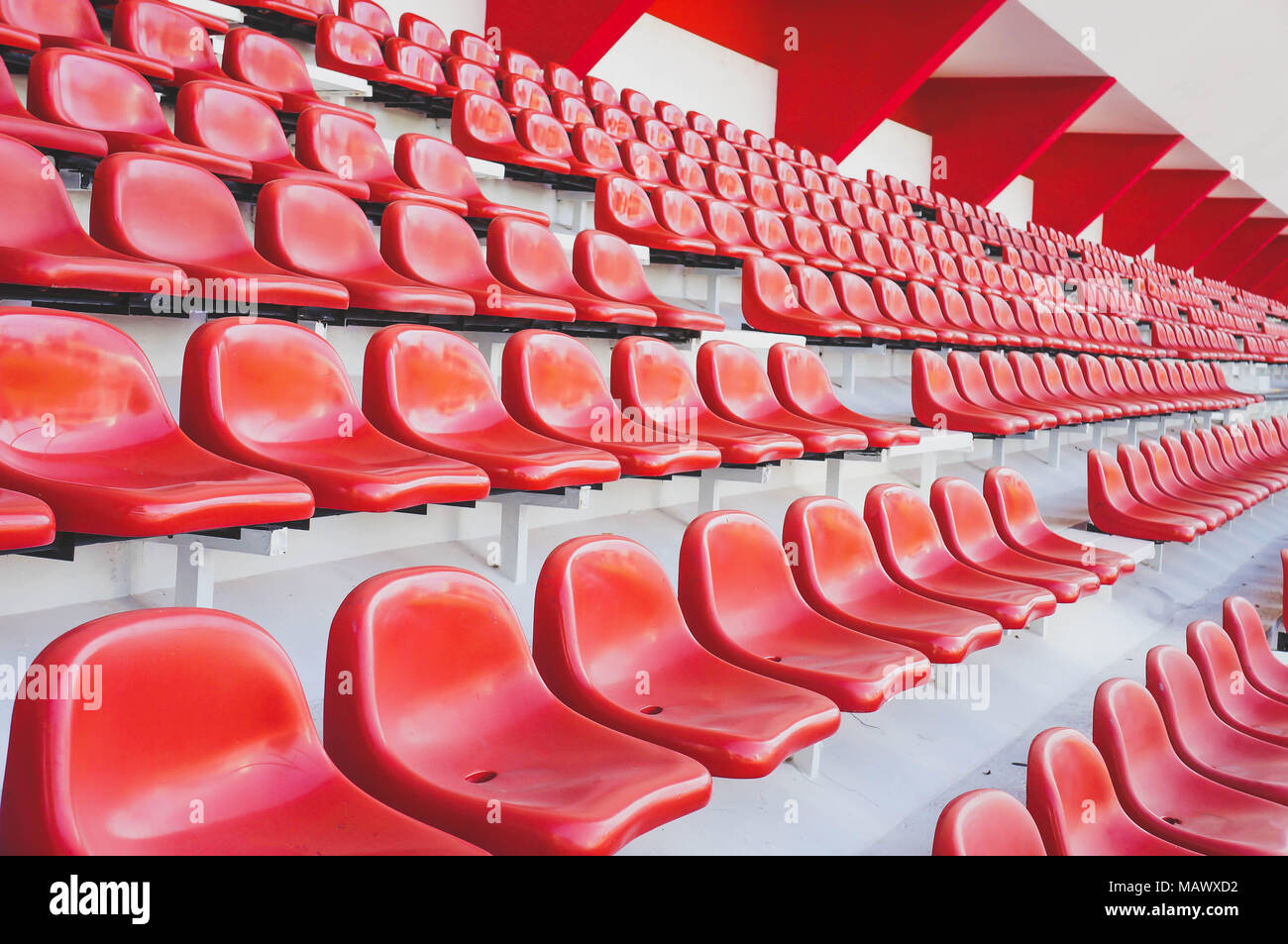 row of red seat at public sport stadium Stock Photo - Alamy