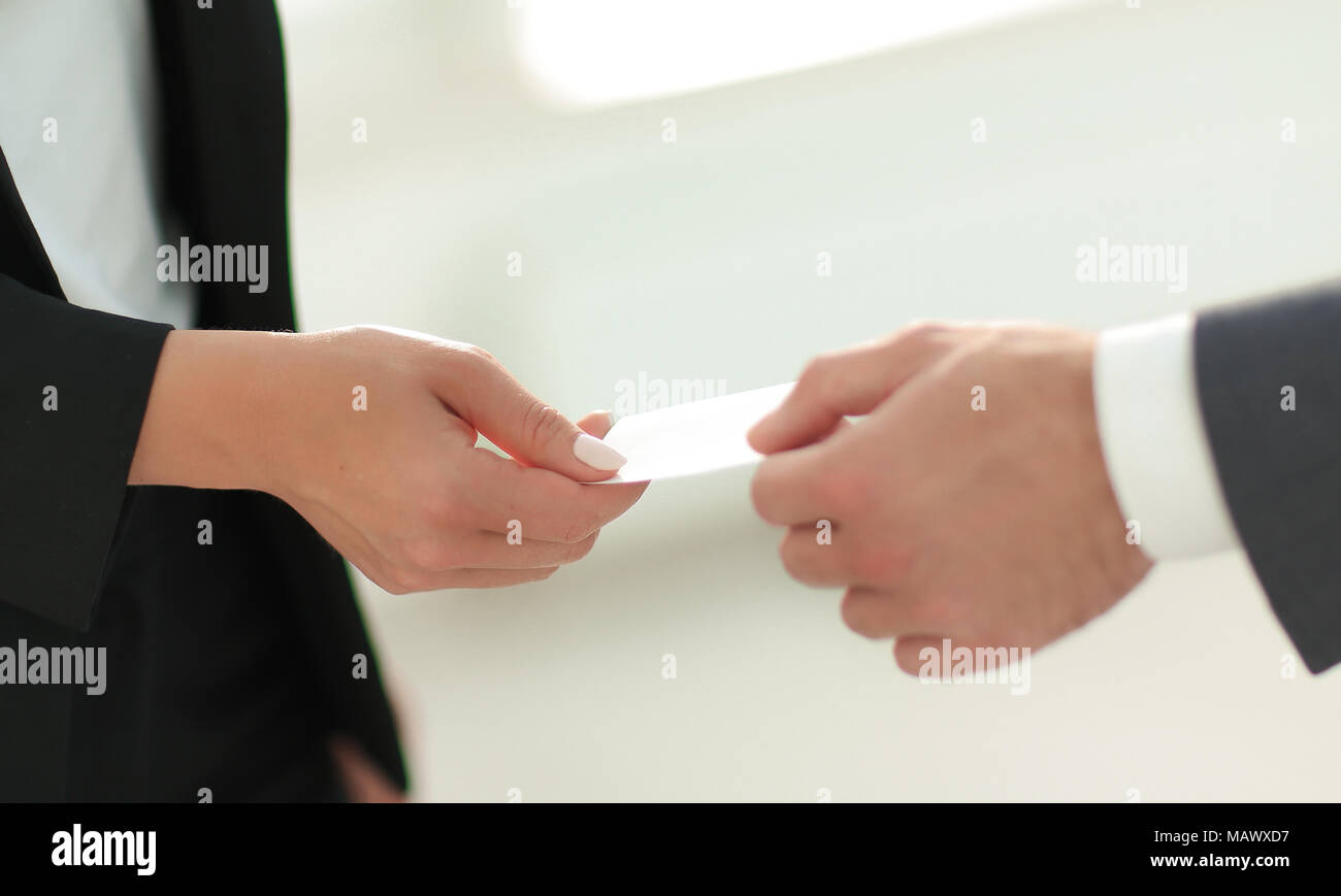 Exchange business card for first time meet Stock Photo - Alamy