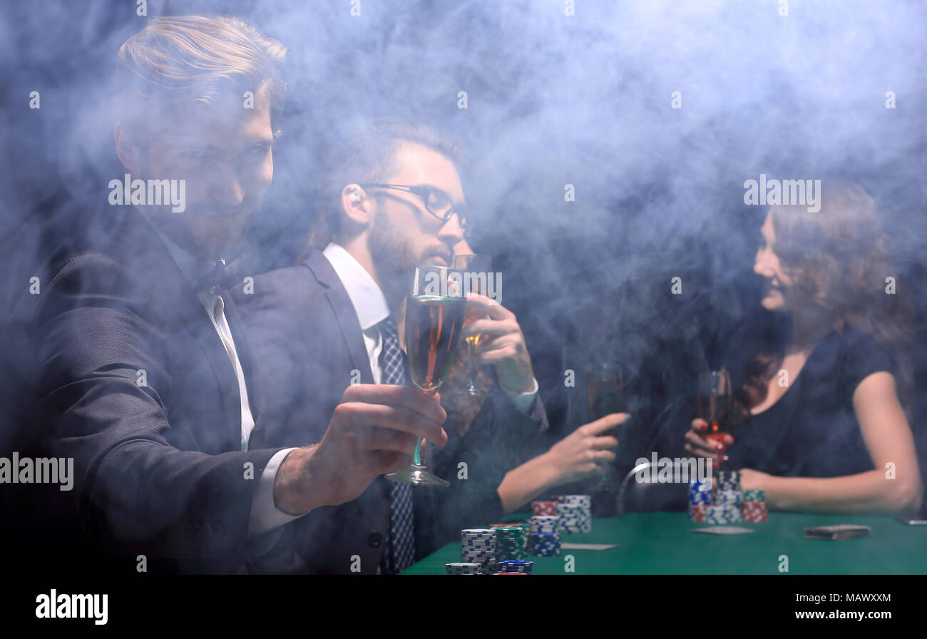 Happy and rich people celebrating their win after successful game Stock ...