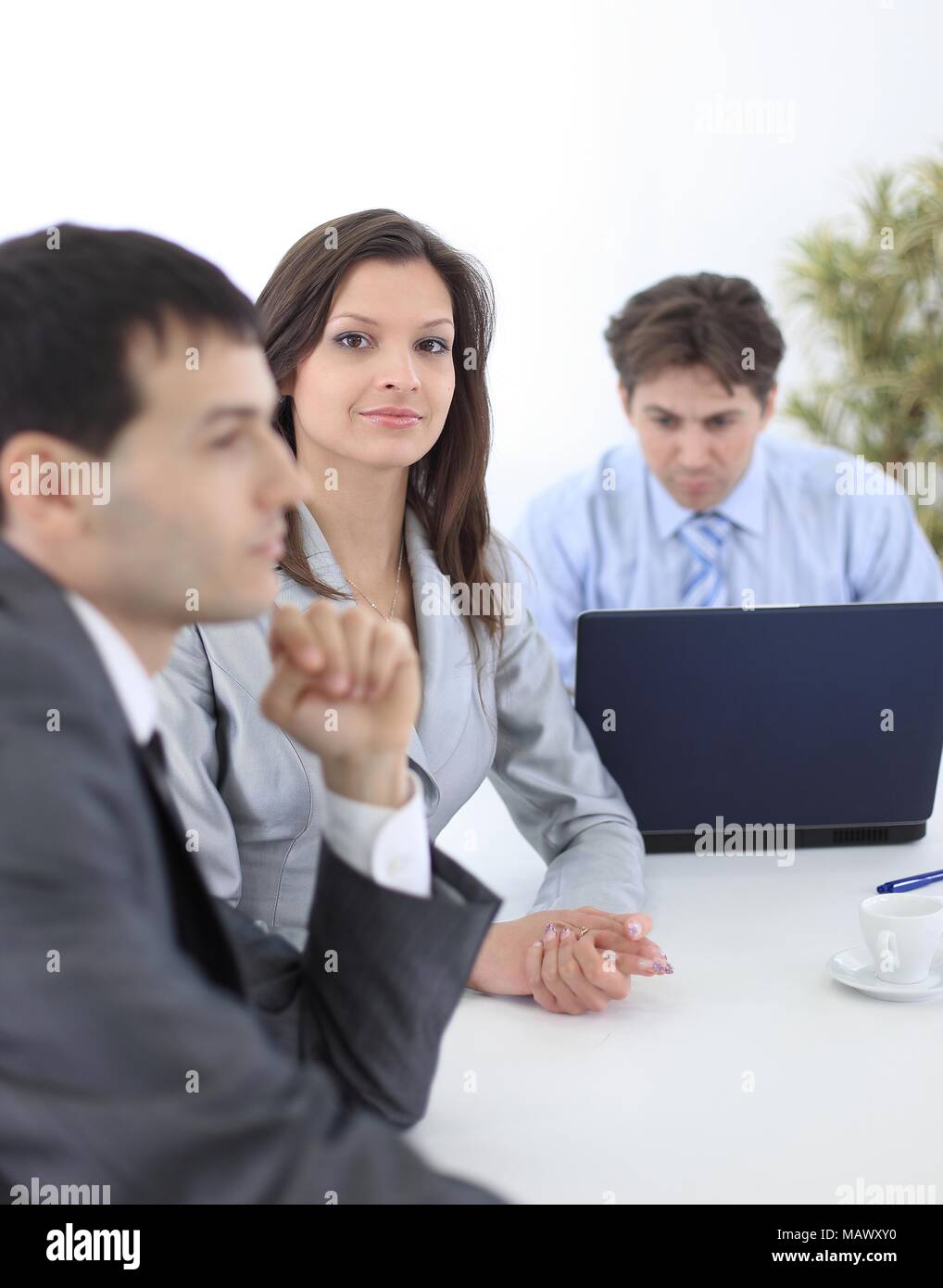 business woman and colleagues at the workplace Stock Photo - Alamy