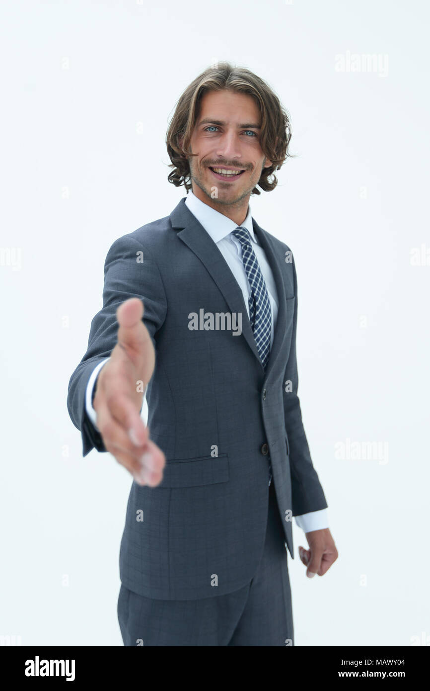 Smiling friendly businessman offers a handshake Stock Photo - Alamy