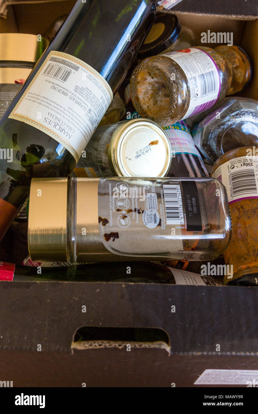 Cardboard box with glass bottles and jars for recycling Stock Photo - Alamy