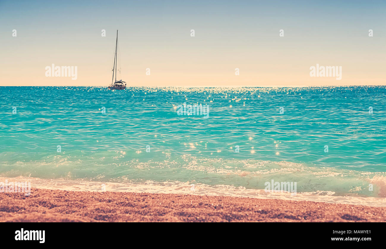 Empty sea and beach background with boat on horizon at nun, Lefkada ...
