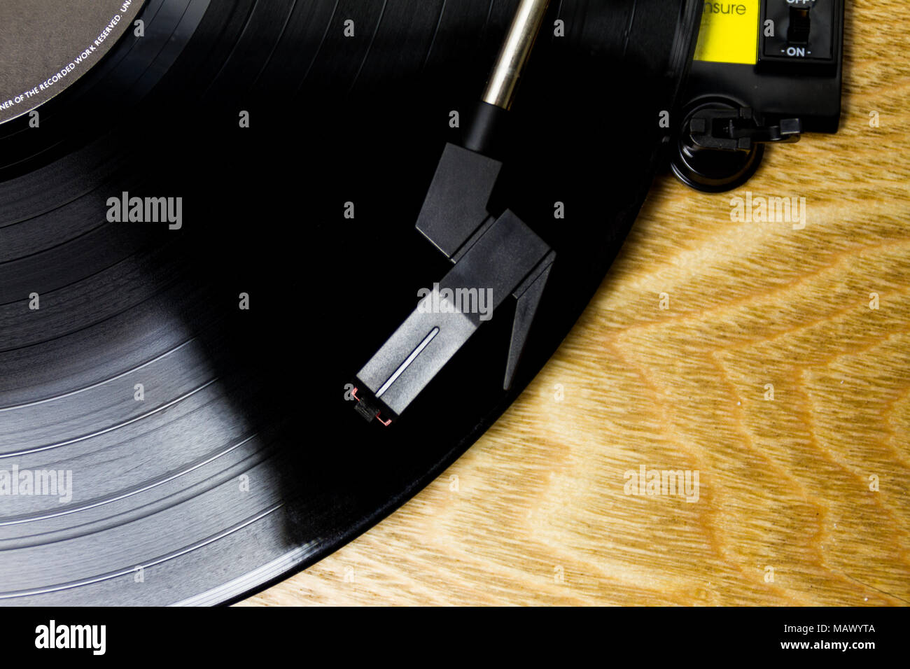 A record player playing a vinyl record Stock Photo - Alamy