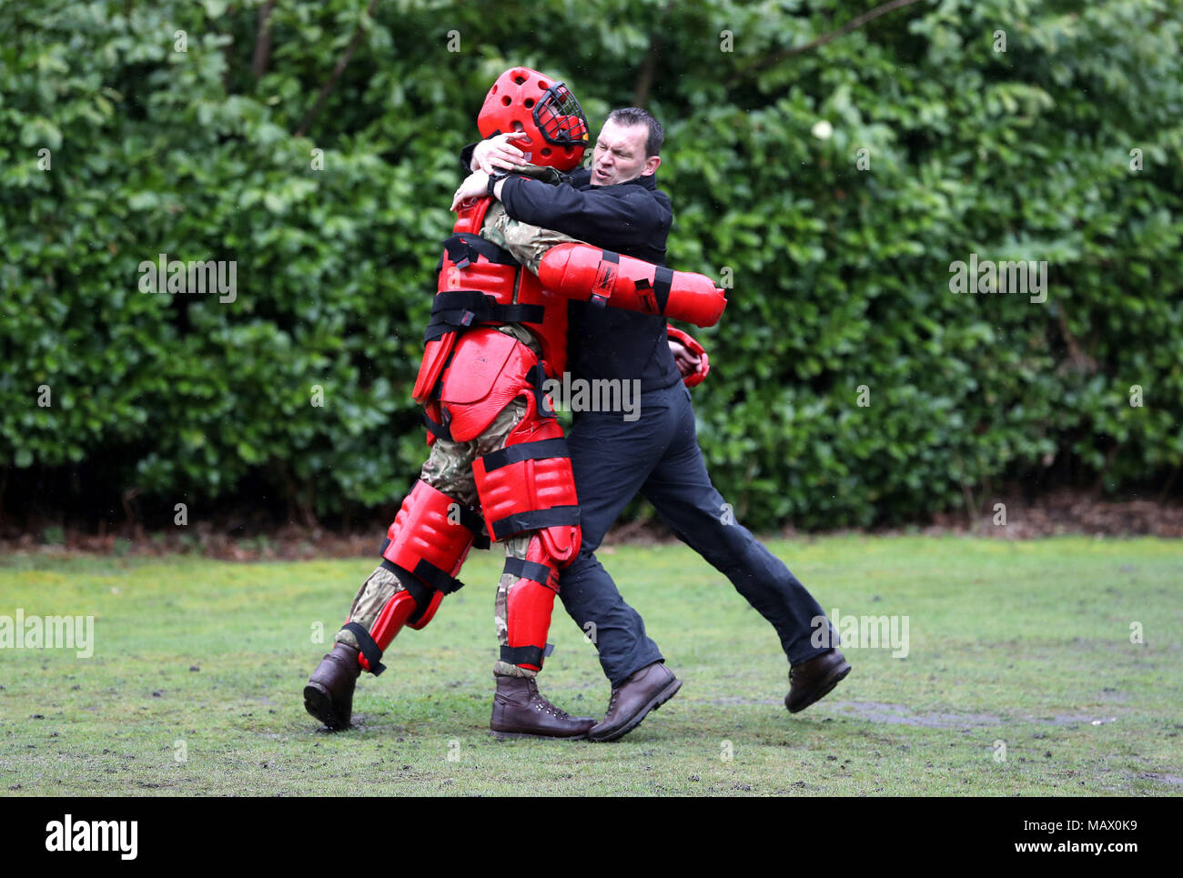 A member of the Close Protection Unit Royal Military Police (right ...