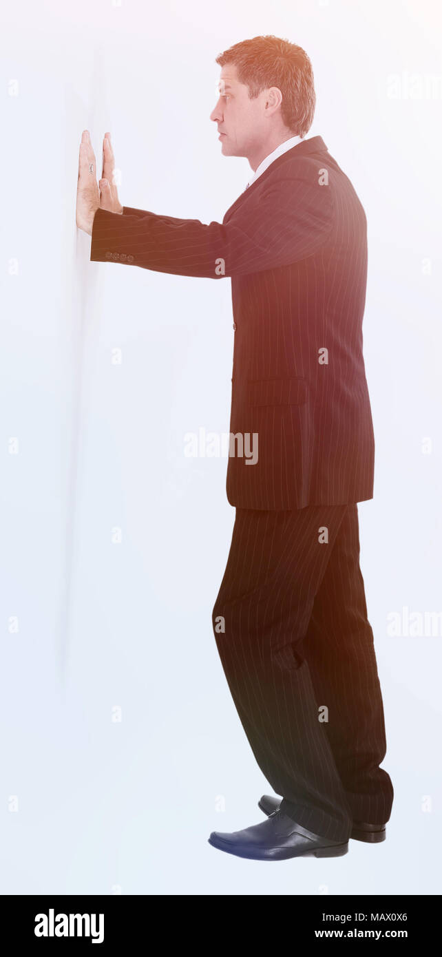 Side view of serious business man on white background Stock Photo - Alamy