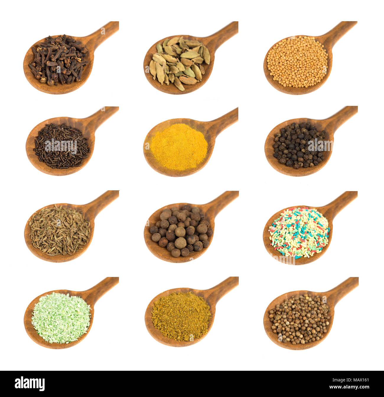 Set or collection of different spices and seeds on wooden spoon ...