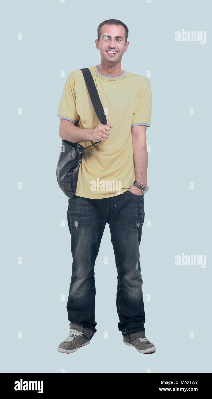 Happy smiling young man standing full length isolated on white Stock ...