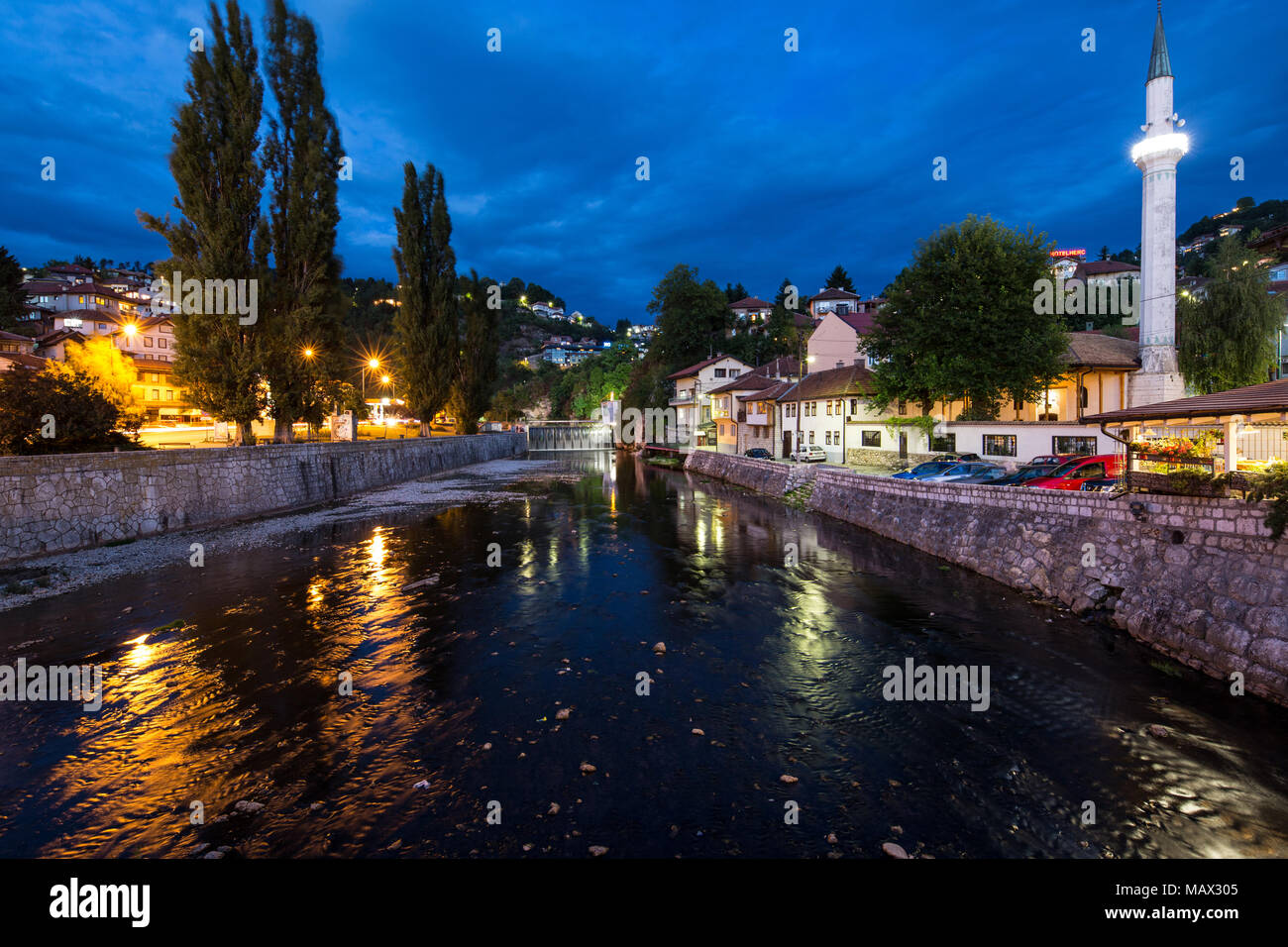 Panorama Night view of The Miljacka iriver that passes through Sarajevo ...