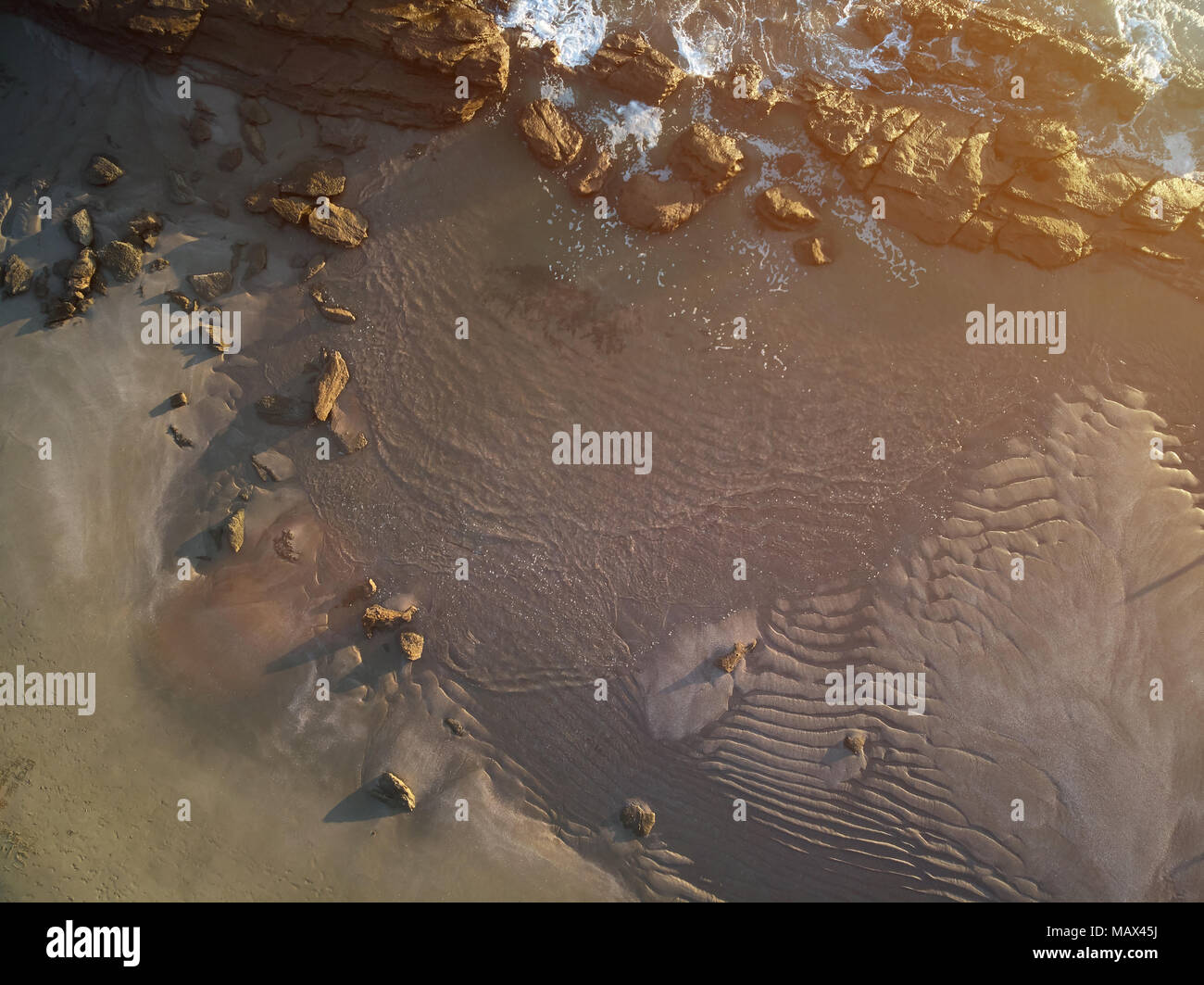 Beach with stones above top view. Sunset background theme Stock Photo ...