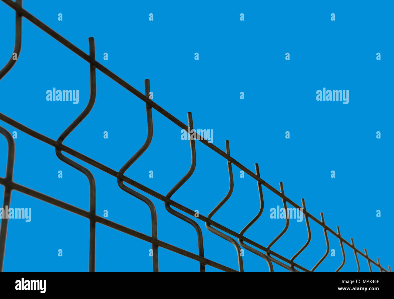 Blue background with fence mesh. Abstract background Steel fence Stock ...