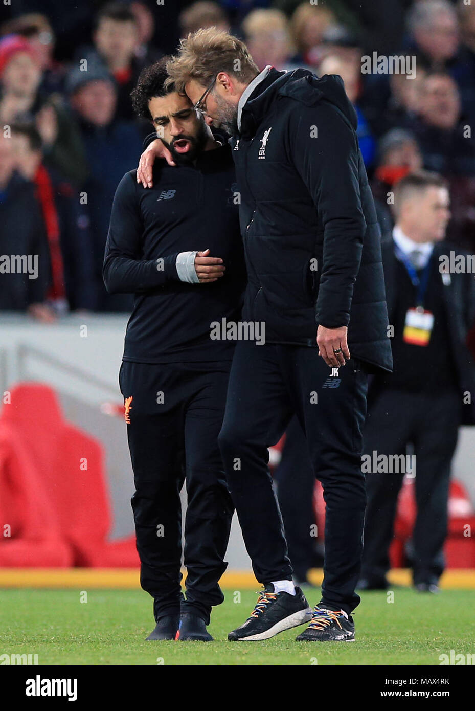 Liverpool Manager Jurgen Klopp With Mohamed Salah After The Uefa