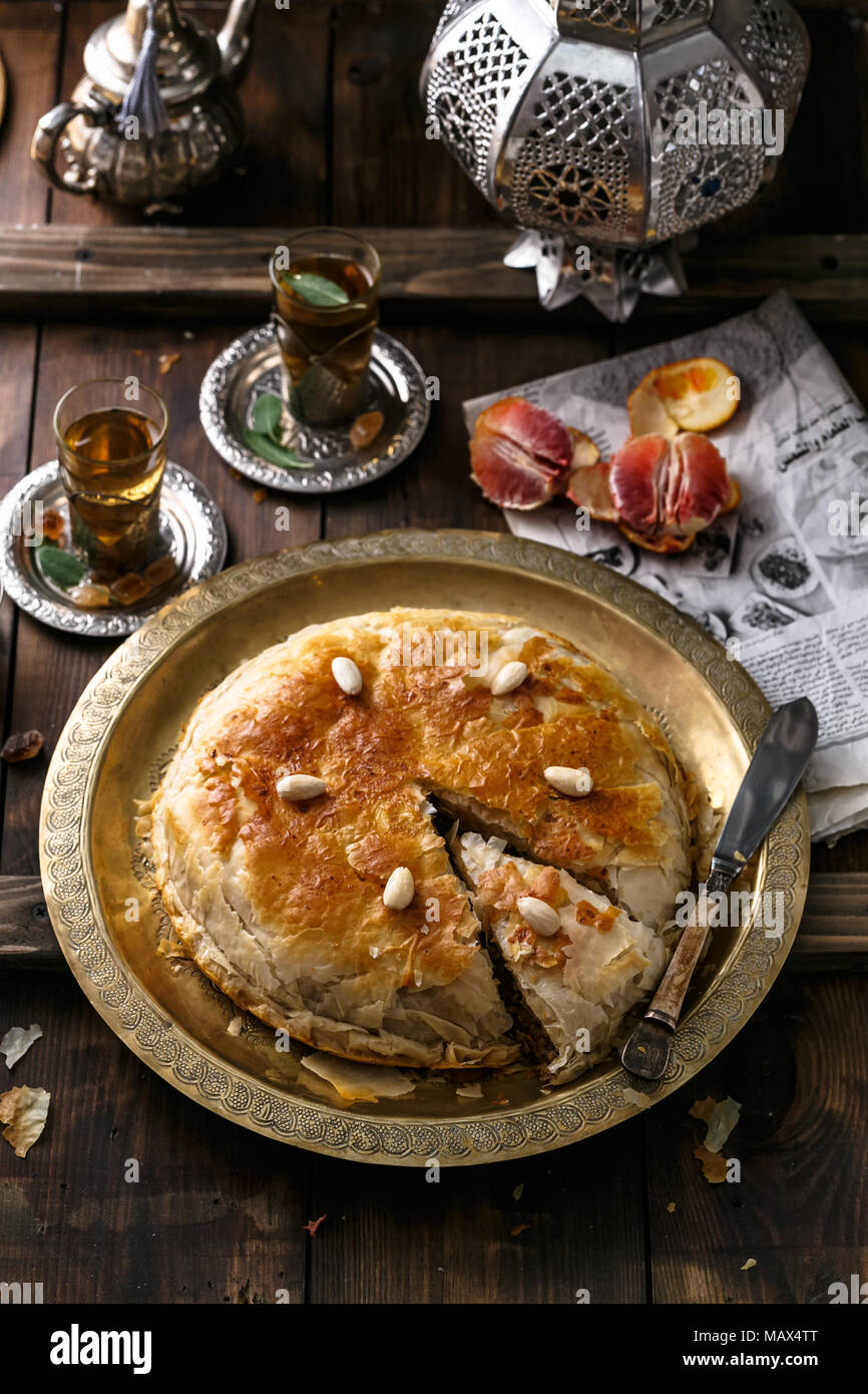 Middle eastern pie with tea, traditional style Stock Photo - Alamy