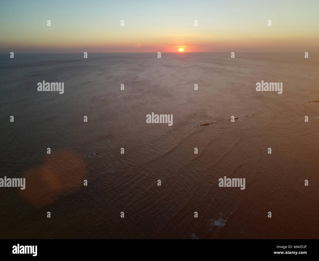 Beautiful sunset over water hi-res stock photography and images - Alamy