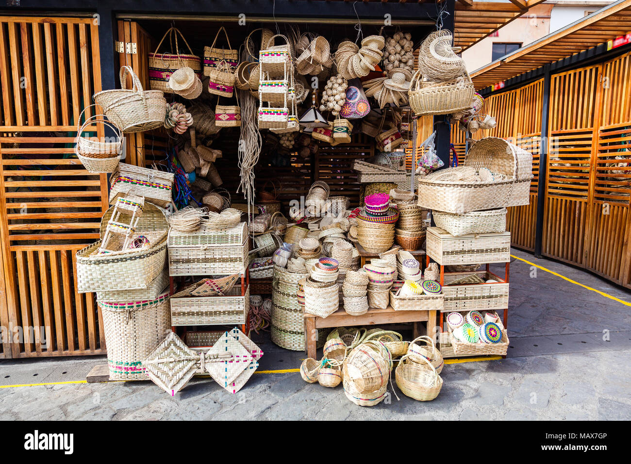 Vegetable fiber baskets, toquilla straw, painted with various colors in ...