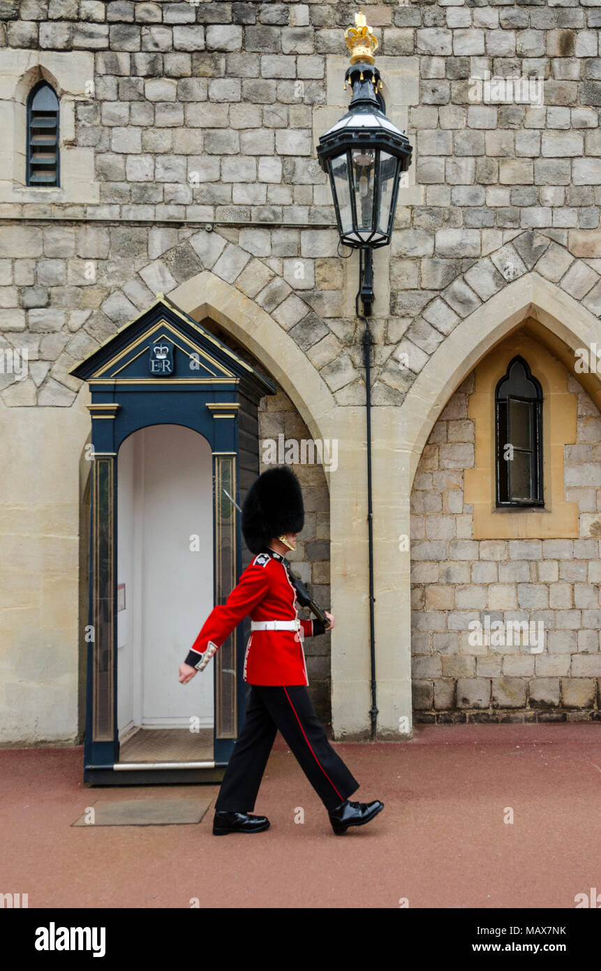 Grenadier Guard foot guard marching on patrol at Windsor castle Stock ...