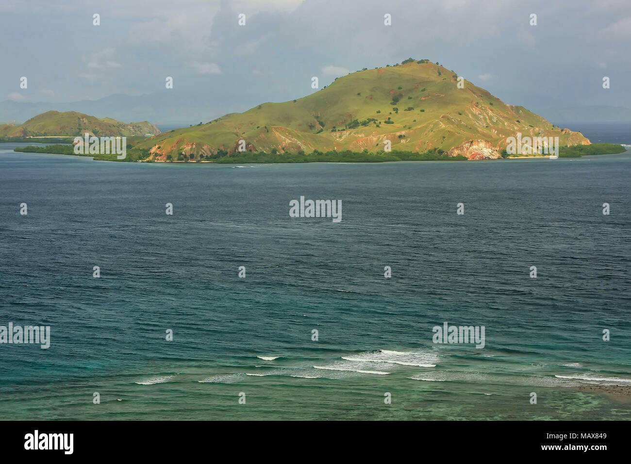 Volcanic island in Komodo Naional Park, Flores Sea, Nusa Tenggara ...