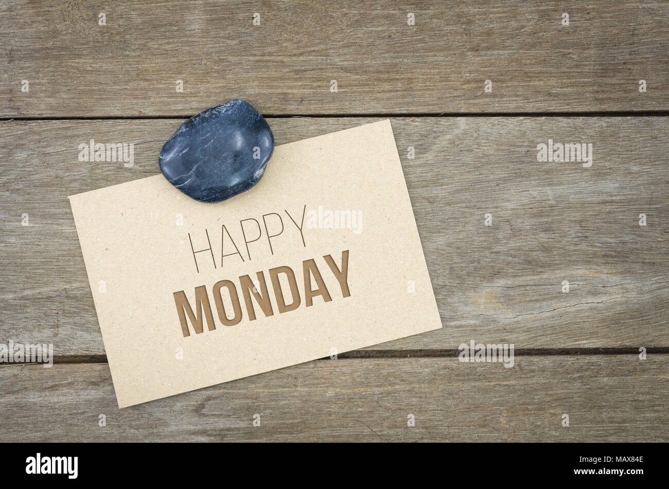 Happy Monday, lifestyle conceptual words with brown paper sheets or ...