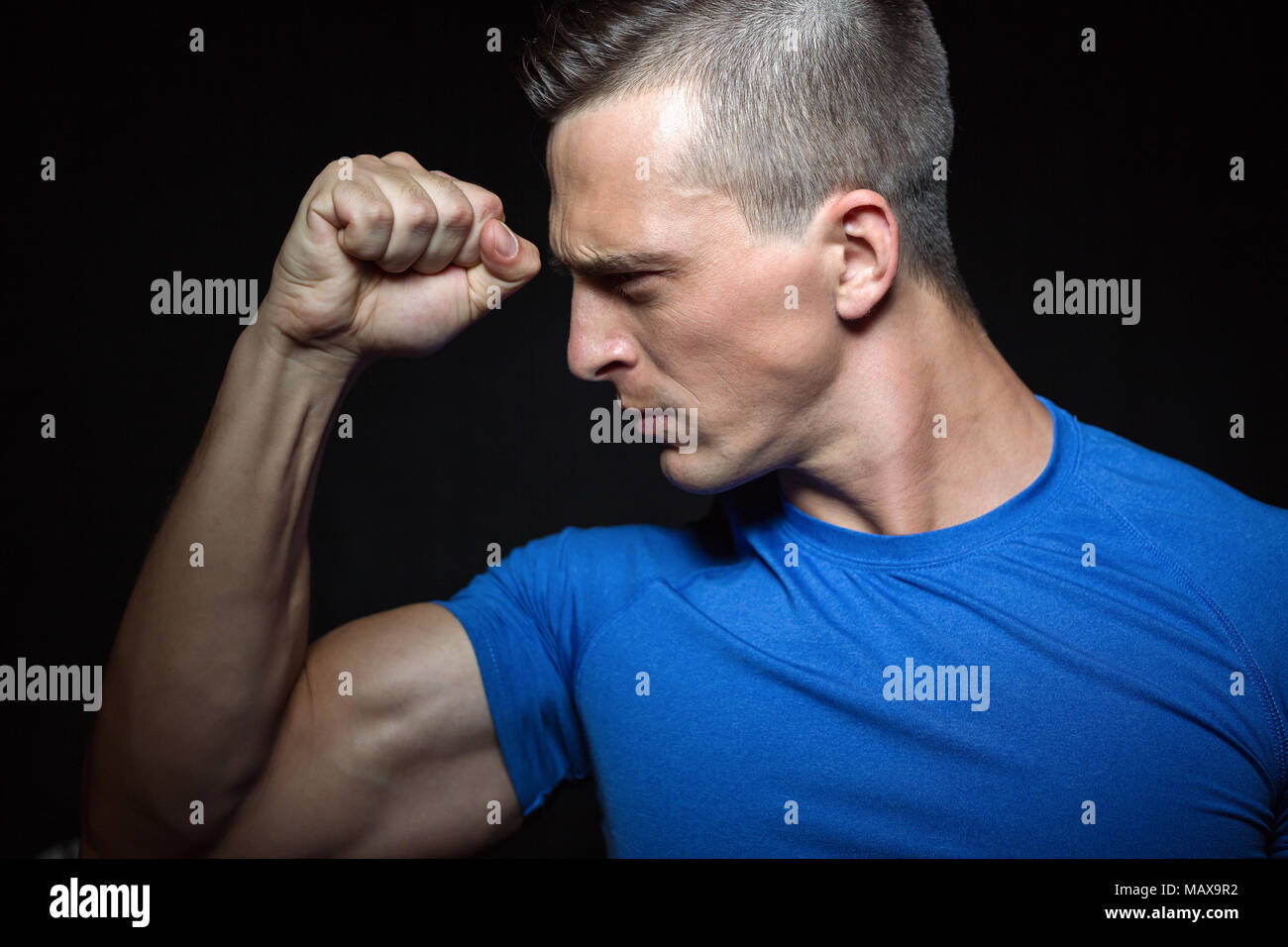 Gym male showing off hi-res stock photography and images - Alamy