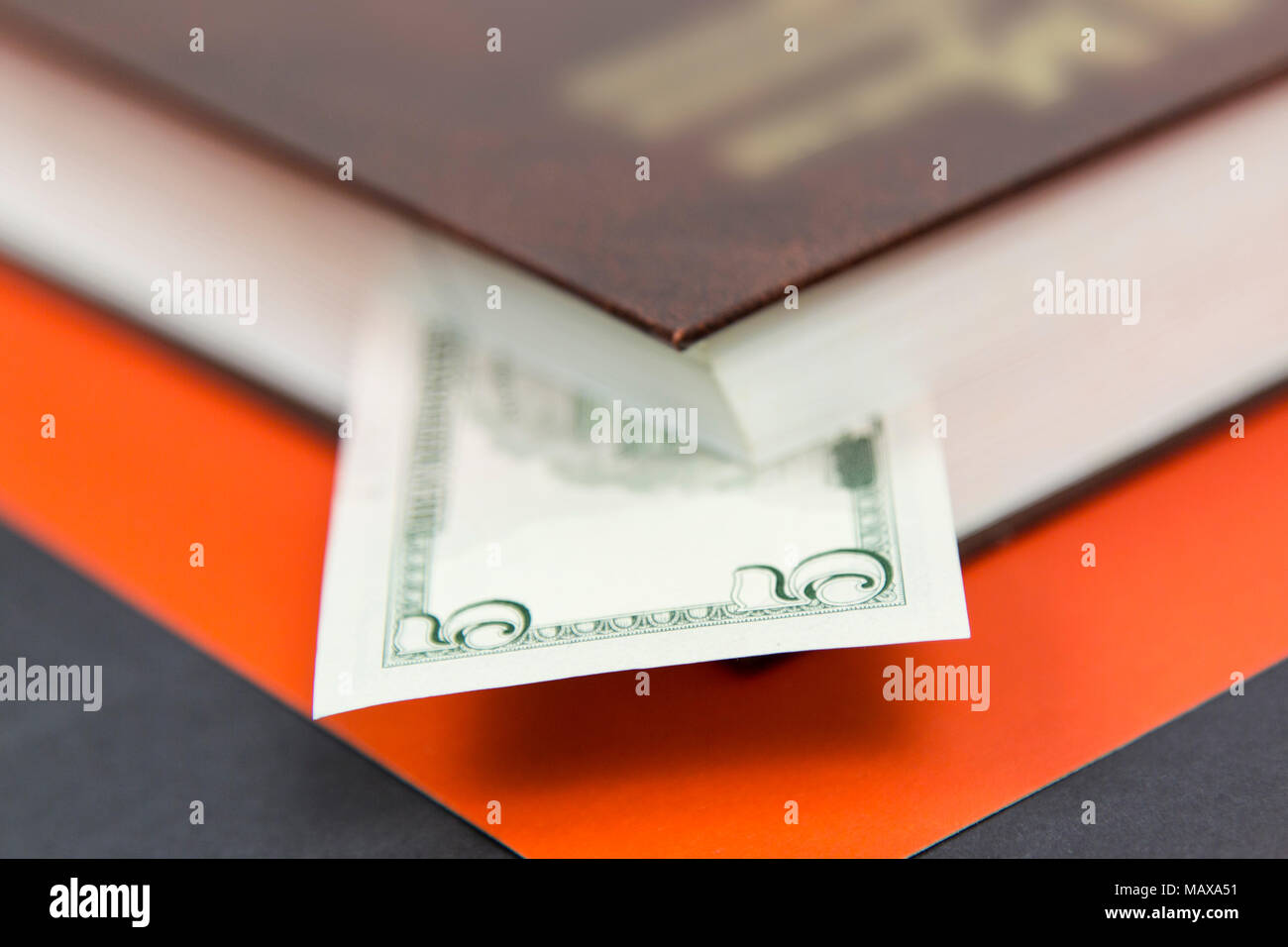 The dollar denomination is used as a bookmark of pages in the book ...