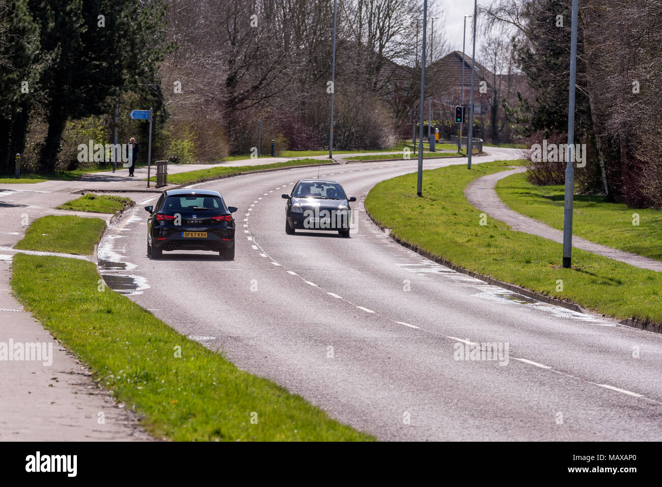 Urban road with cars Stock Photo - Alamy