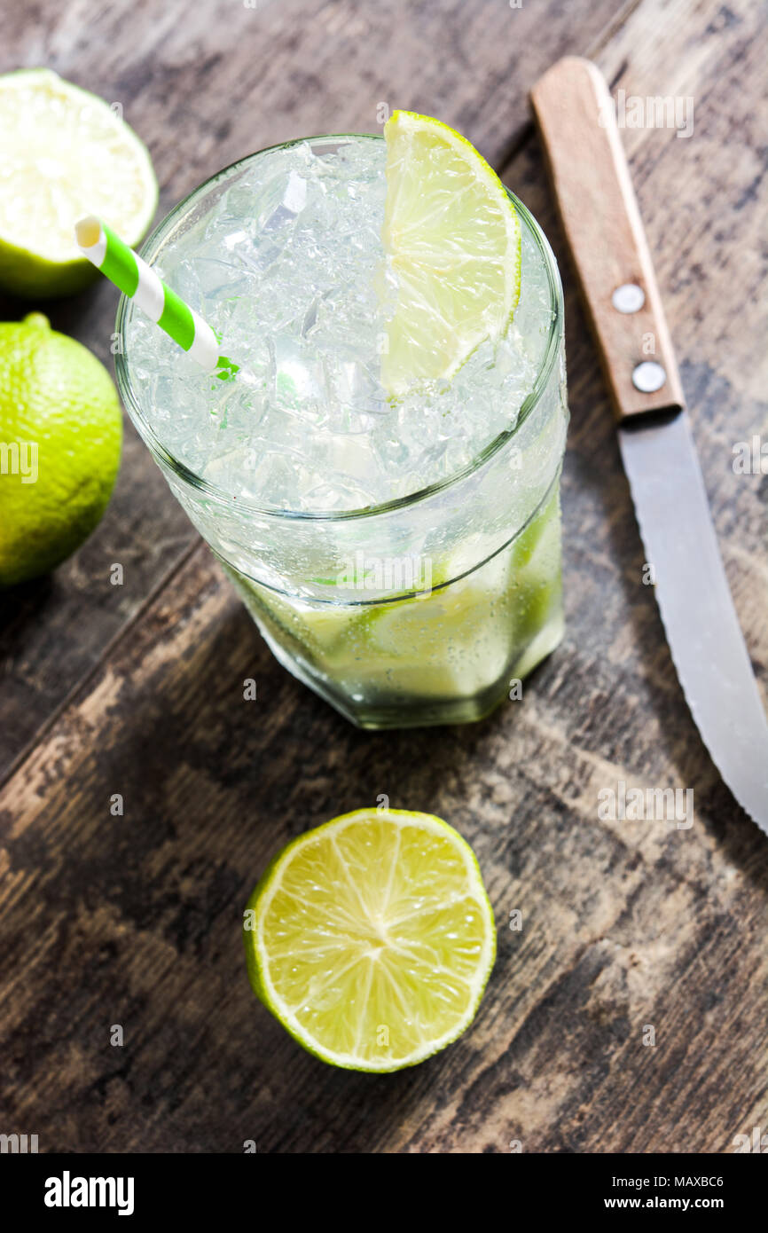 Caipirinha cocktail in glass on wooden table background Stock Photo - Alamy