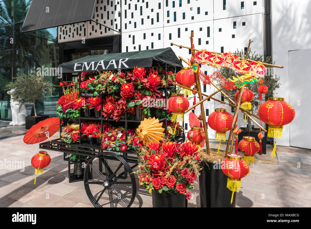 A decorative cart with flowers at the Dubai Plaza in downtown Dubai ...