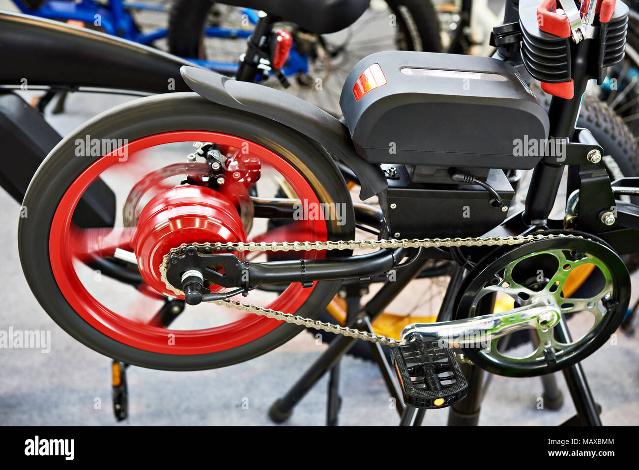 Electro bike on the test stand in the store Stock Photo - Alamy