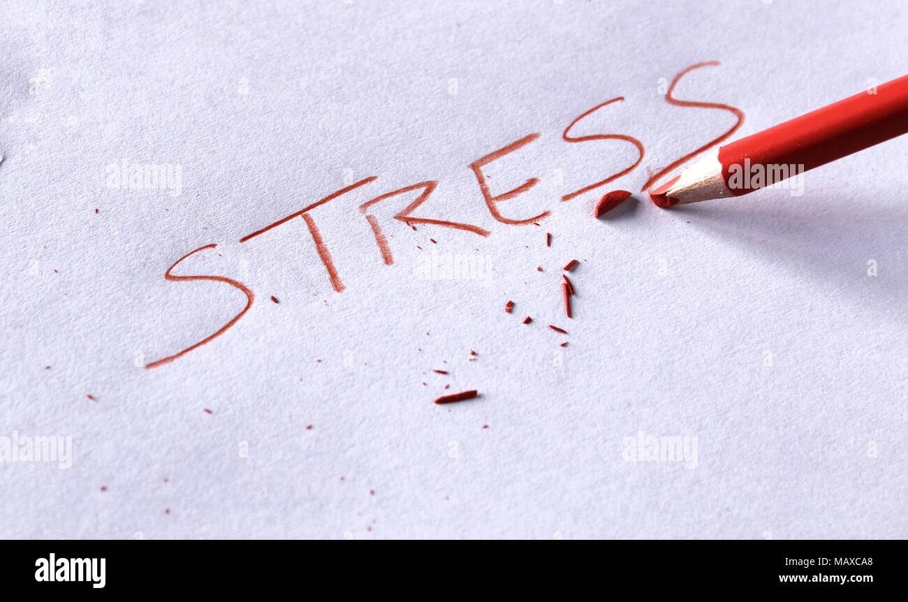 Stress Concept. Word stress written on white paper with black broken ...