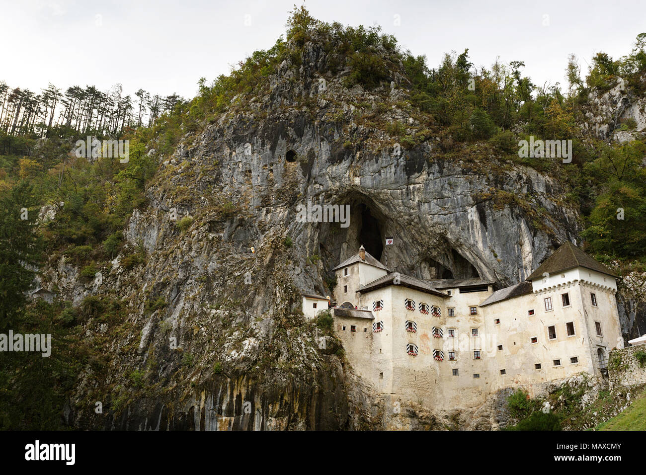 Renaissance Castle Built Inside the opening of a cave in Predjama ...