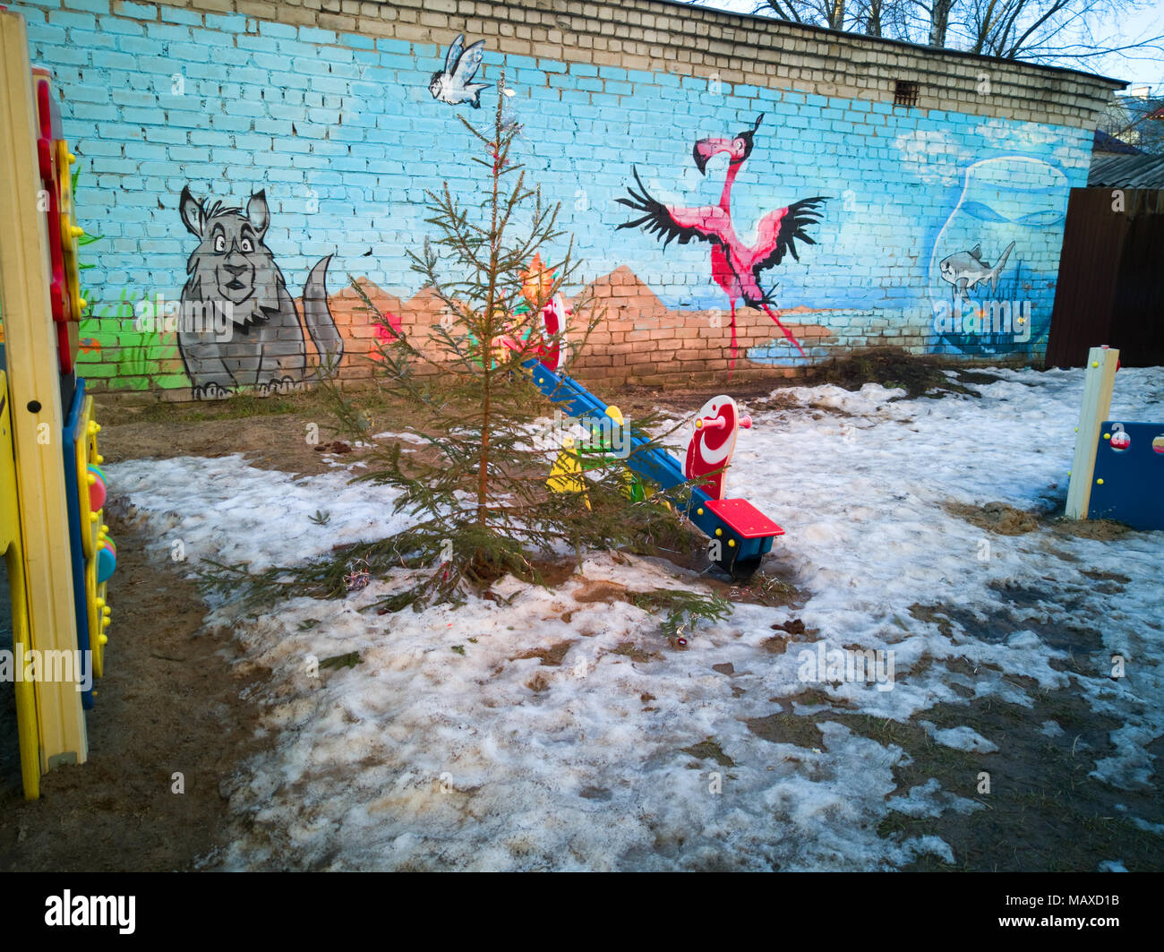 Graffiti on the wall of a children's Playground in the yard of a house ...