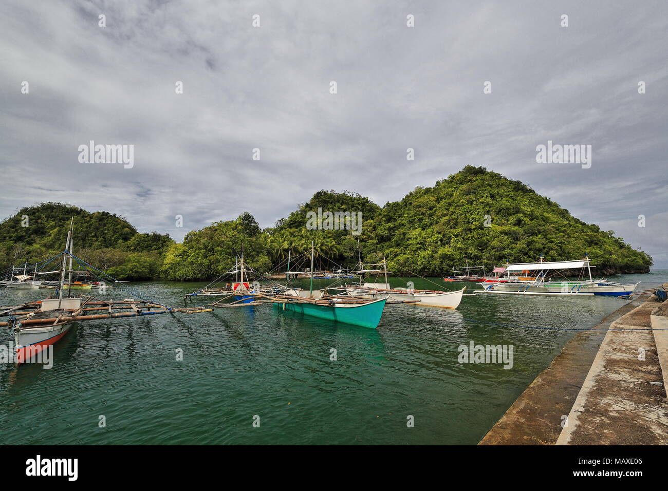 Balangay or bangka boats for fishing and tourist service anchored at ...
