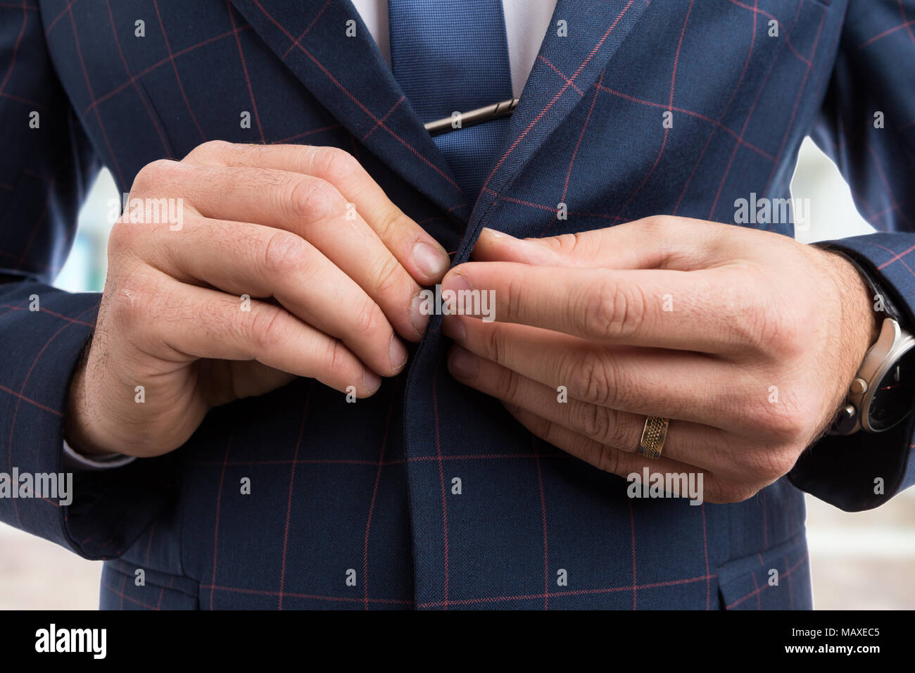 Button fastening jacket hi-res stock photography and images - Alamy