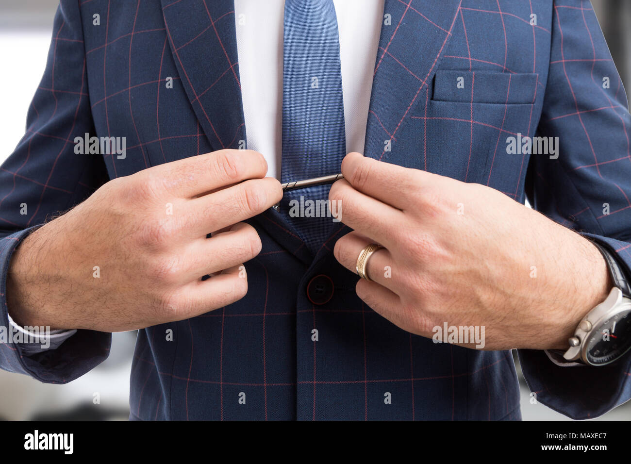 Man hands adjusting business suit jacket as elegance luxury clothing ...