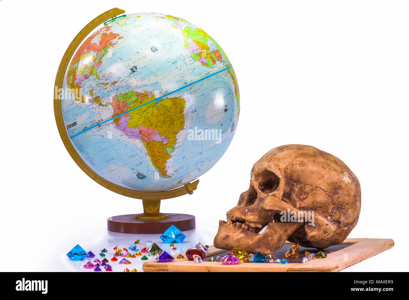 head skull on diamonds beside orb in white background Stock Photo - Alamy