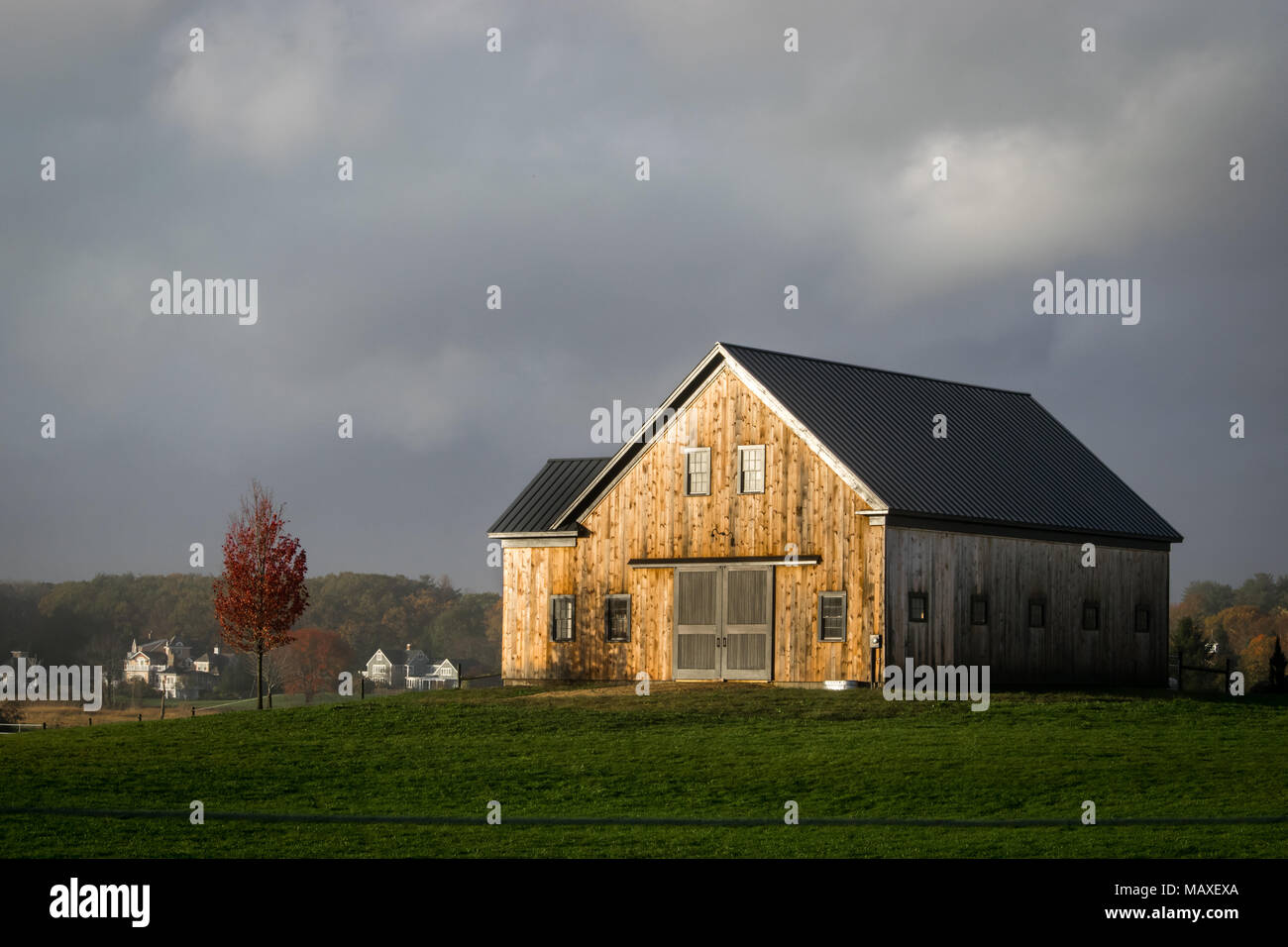 Sun on barn after thunderstorm Stock Photo - Alamy