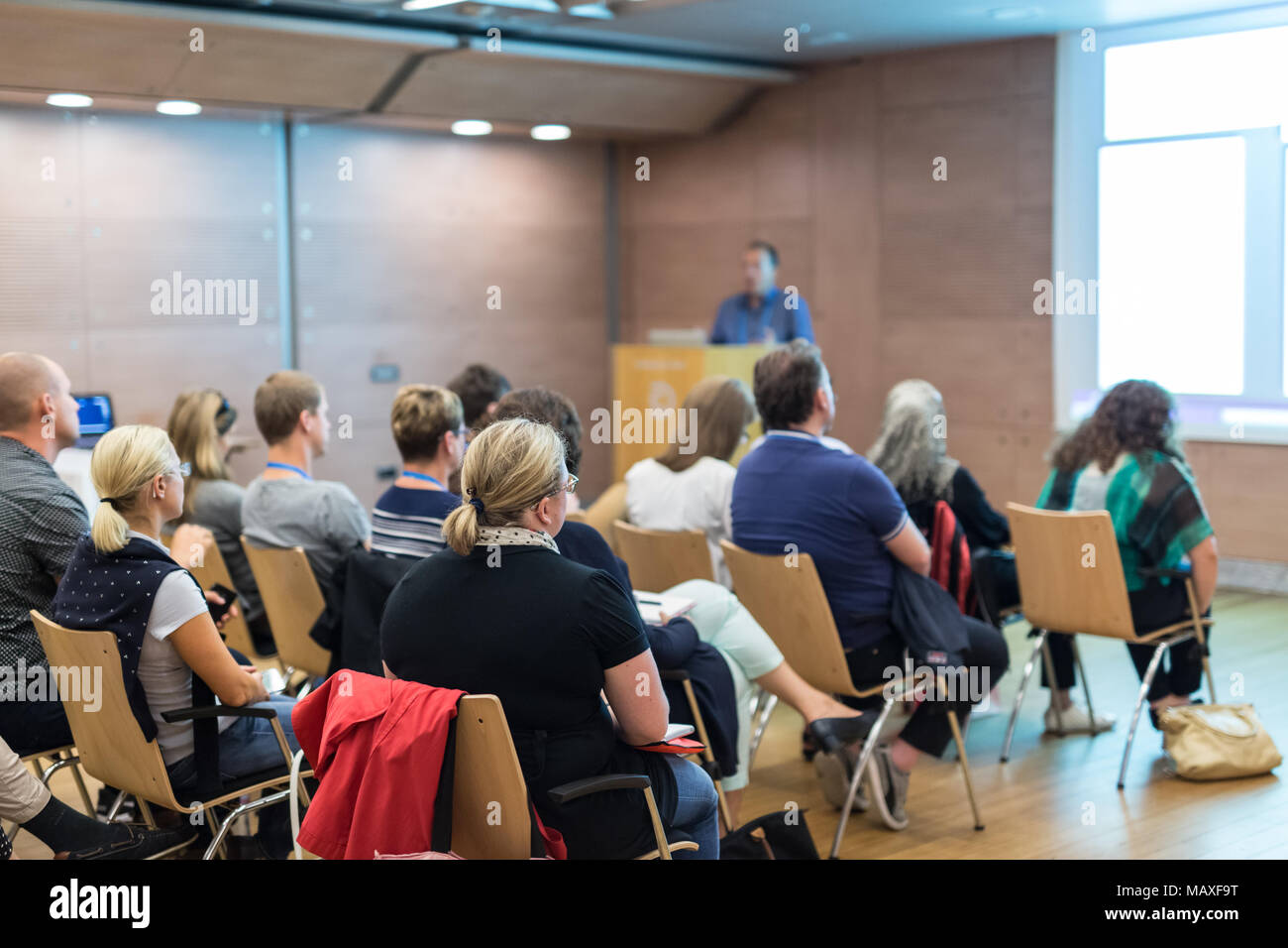 Speaker giving presentation on health care conference Stock Photo - Alamy