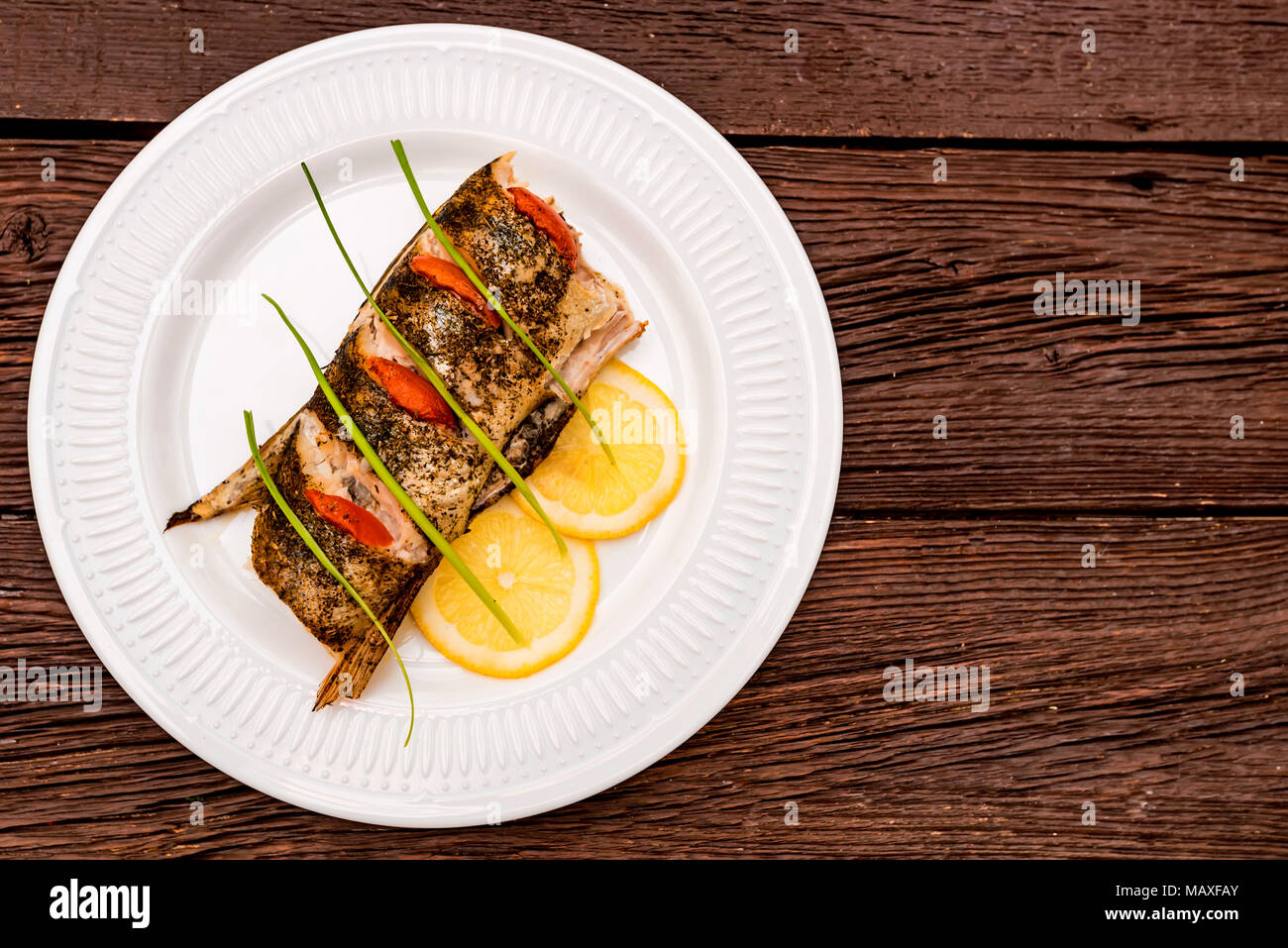 Roasted zander fillet with asparagus and lemon Stock Photo - Alamy