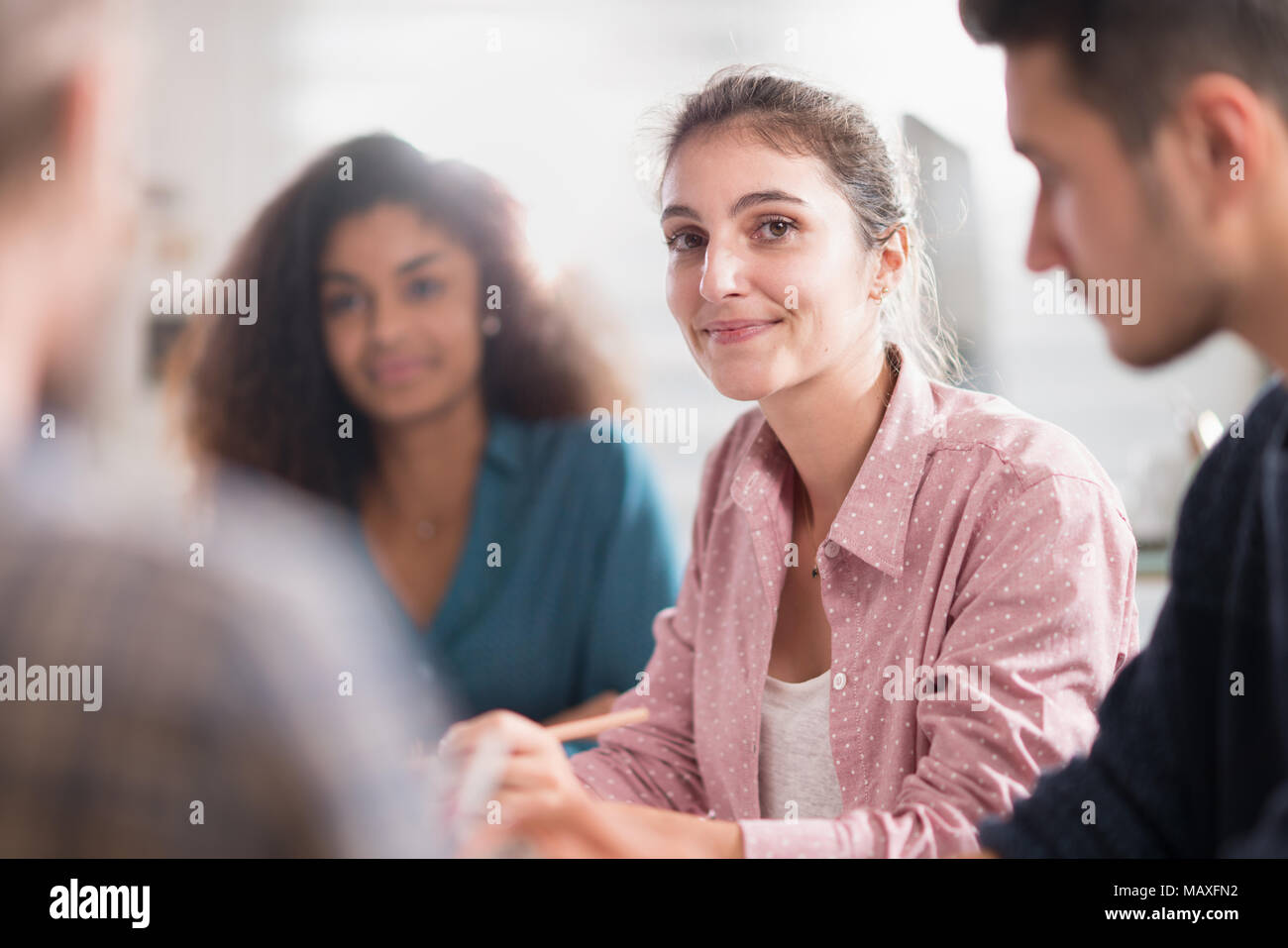 Meeting at college . A working multiethnic students group Stock Photo ...