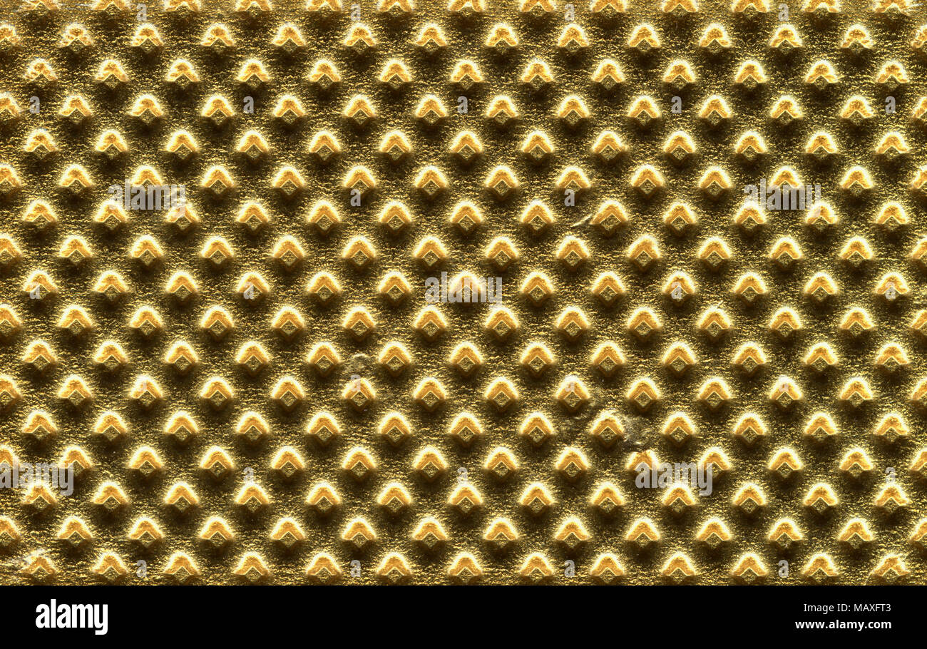 embossed gold metal texture useful as a background Stock Photo - Alamy