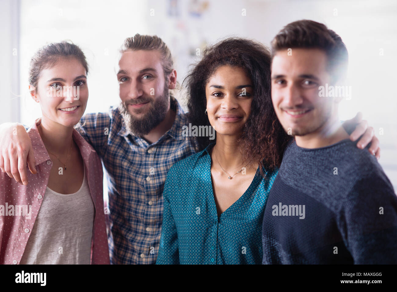 Friends hugging 20s hi-res stock photography and images - Alamy
