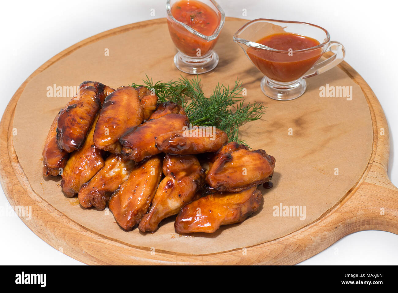 Grilled chicken wings on a tree white background Stock Photo - Alamy