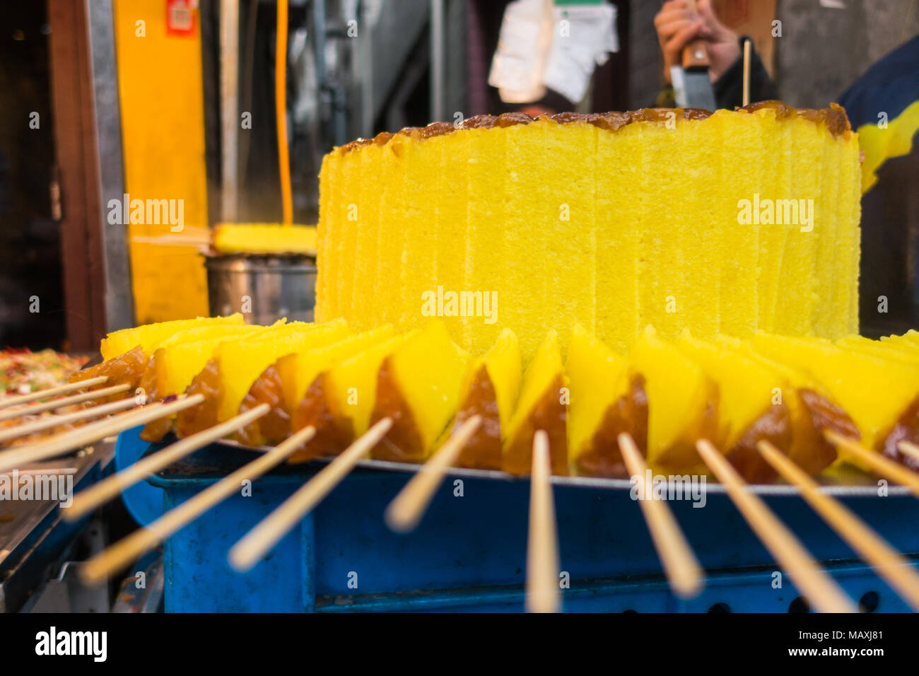 Sweet Brightly Colored Yellow Cake at Traditional Chinese Market with ...