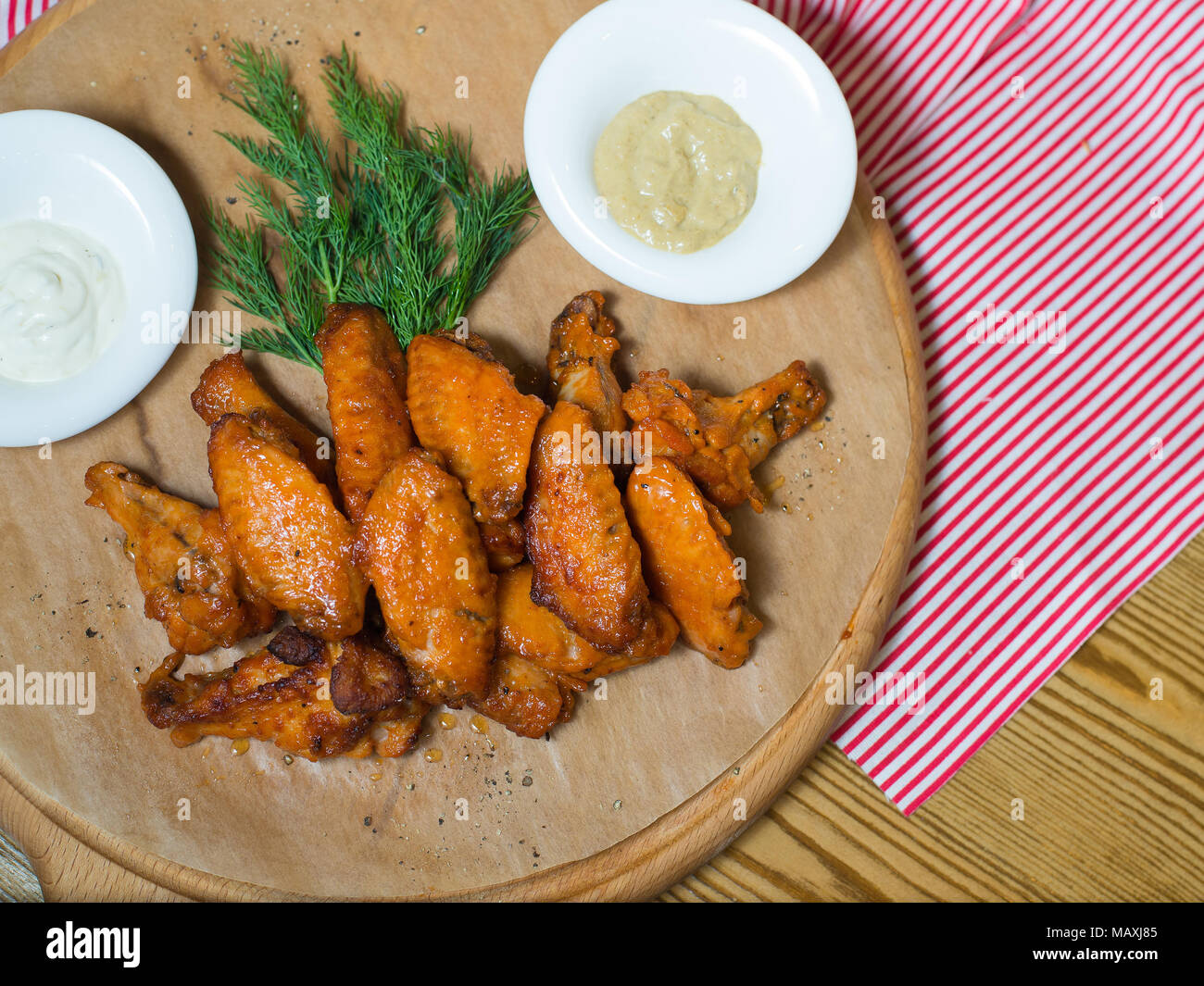 Grilled chicken wings on a tree dill Stock Photo - Alamy