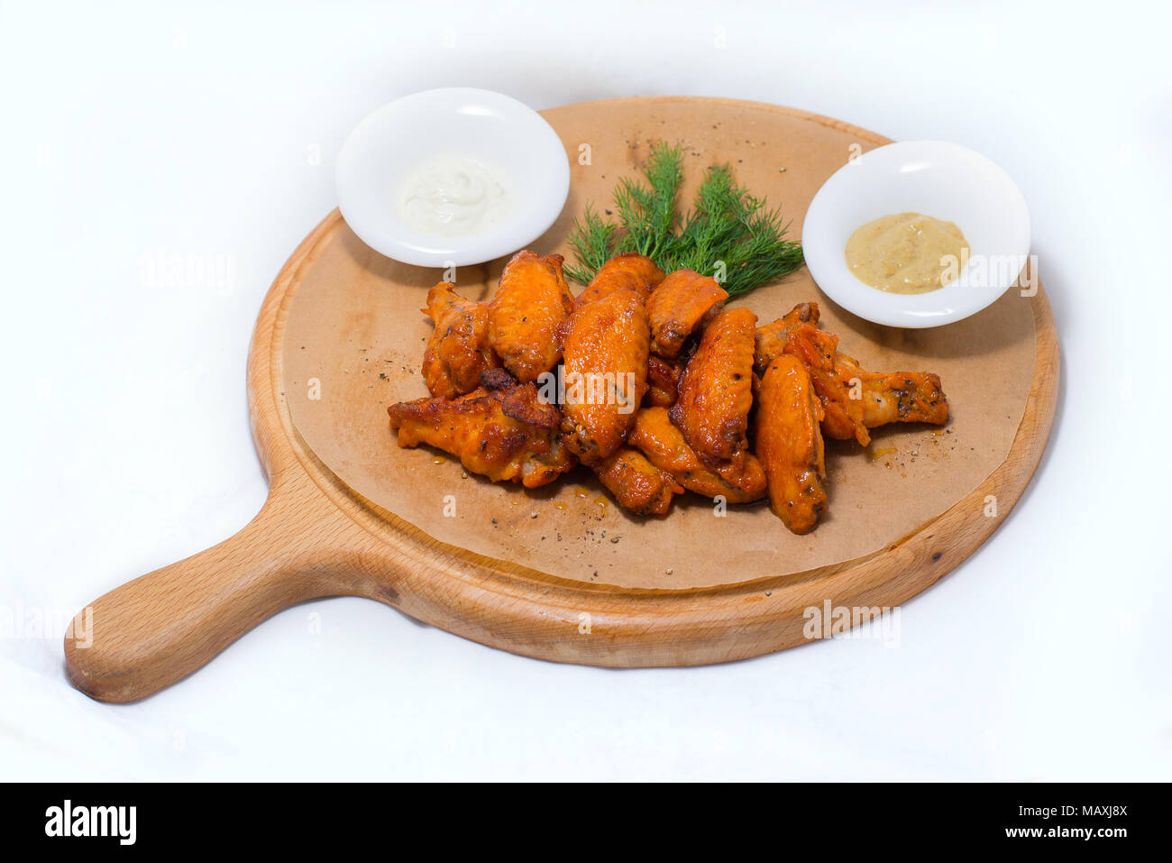 Grilled chicken wings on a tree white background Stock Photo - Alamy